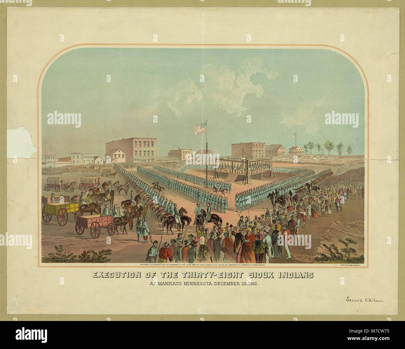 A somber historical photograph documenting the execution of thirty ...