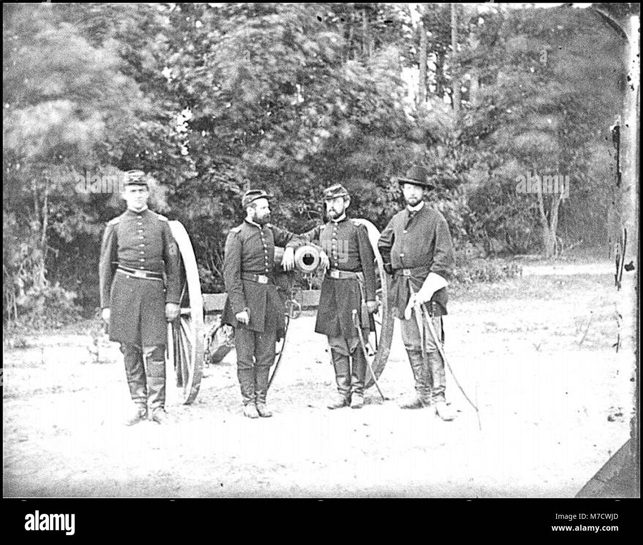 Capt. Horatio G. Gibson (second from left) and officers of his battery ...
