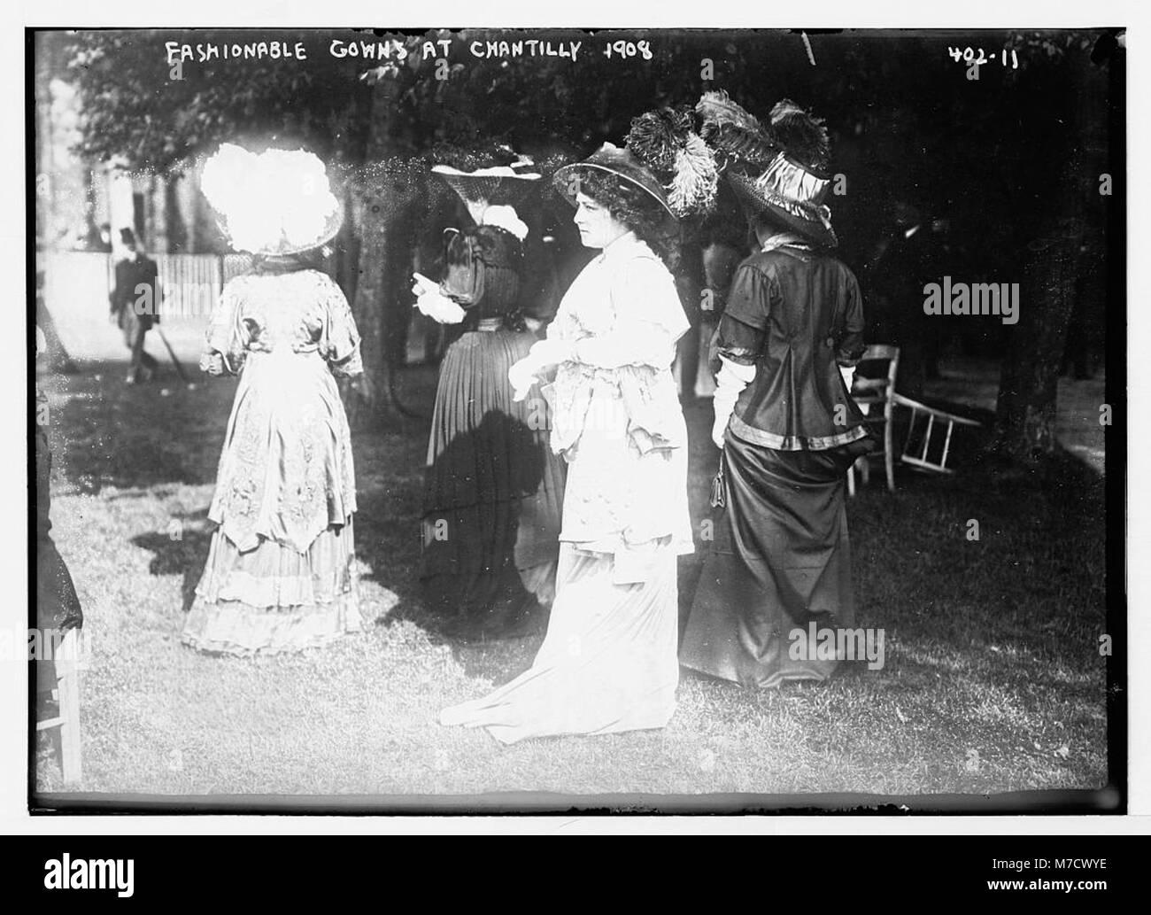 Photograph showcasing fashionable gowns from 1908, captured during a ...