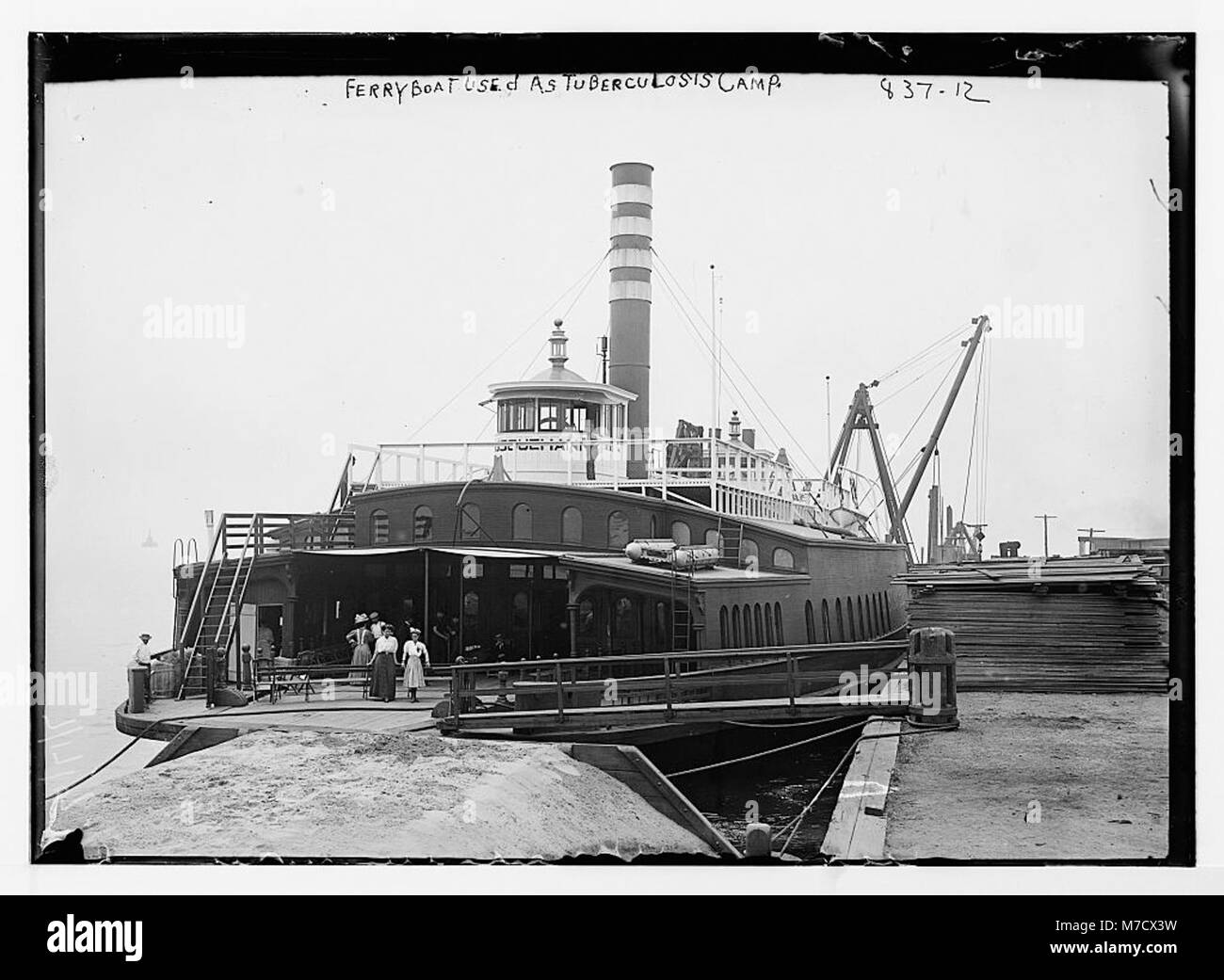 An image showing a ferryboat repurposed as a tuberculosis camp ...