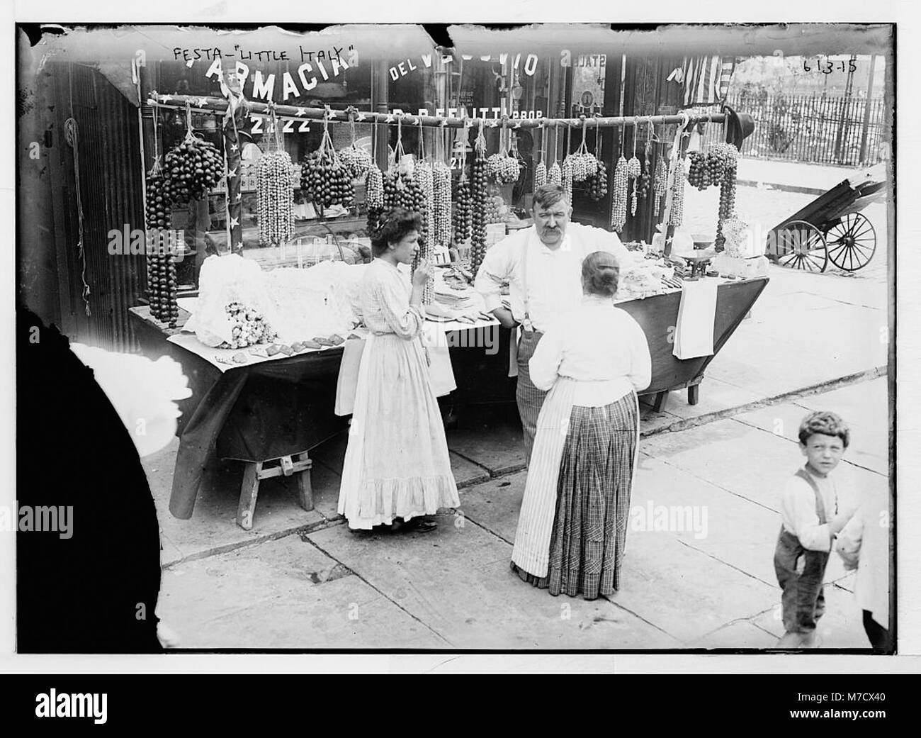 A lively celebration during the Festa in 'Little Italy,' showcasing the ...