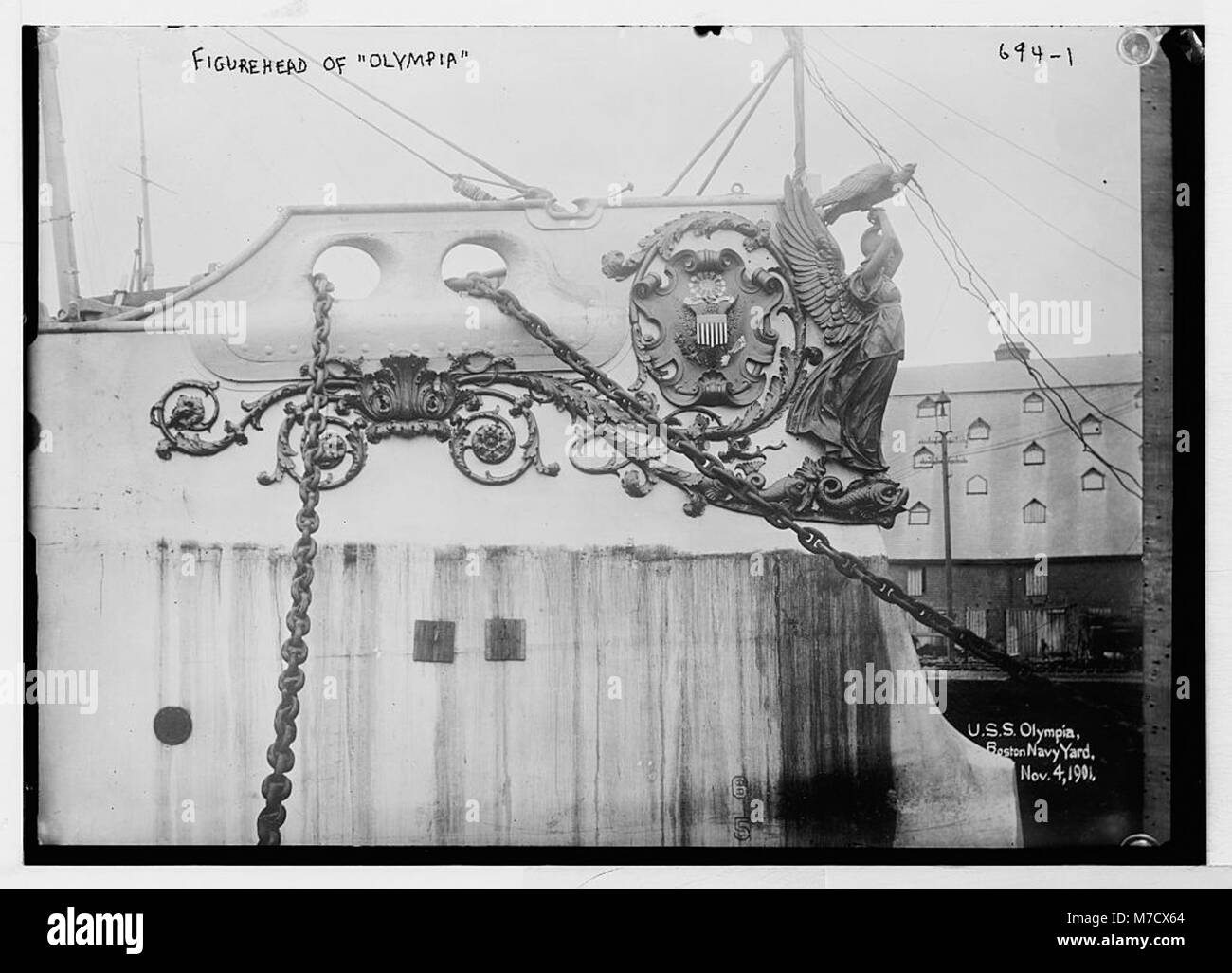 This image captures the figurehead of the U.S.S. Olympia, a famous ...