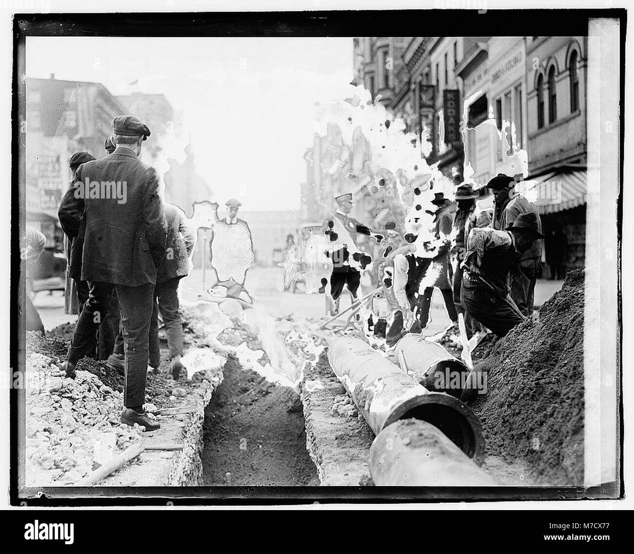 A view of a fire caused by a gas main explosion at 13th and F streets ...
