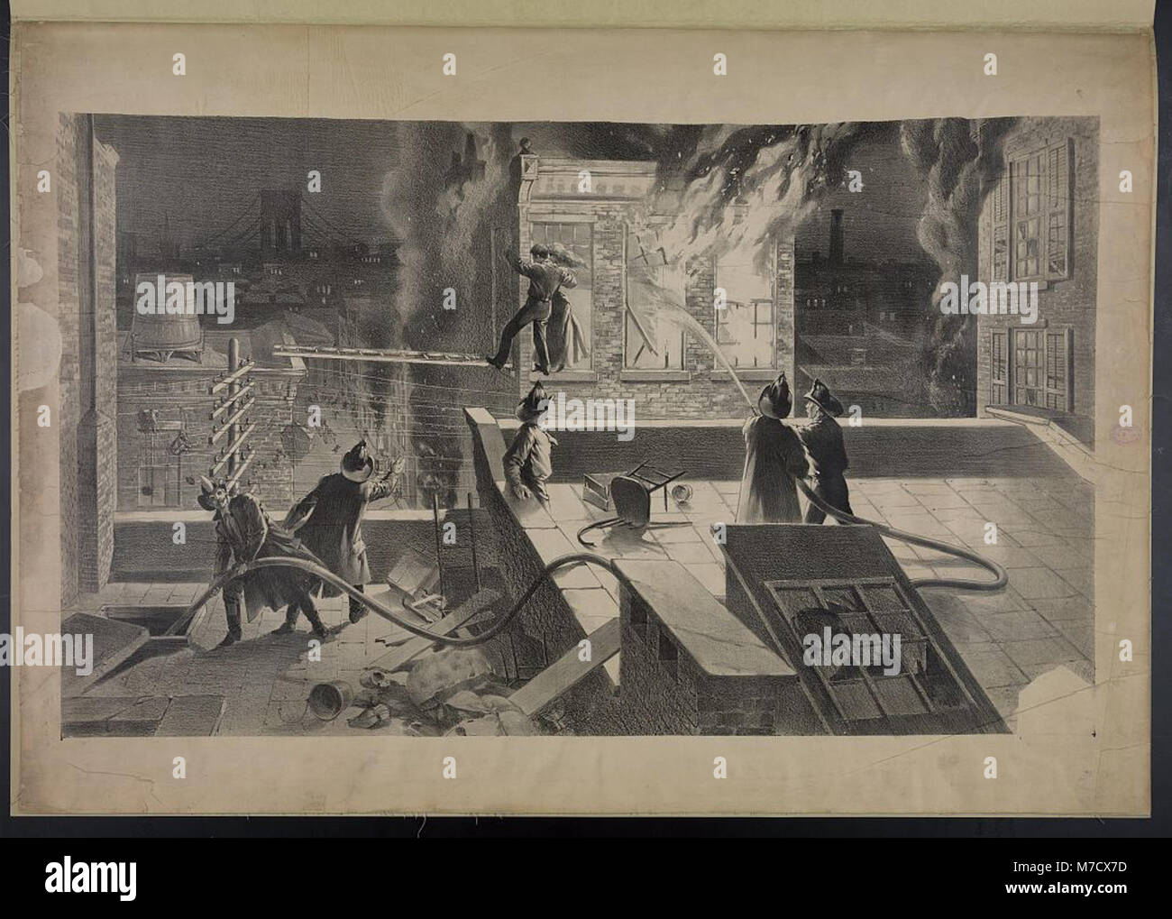 Firefighters battling a large blaze from city rooftops. The image shows ...