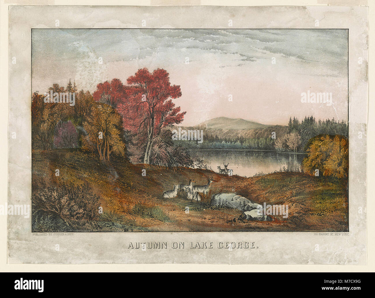 A scenic view of Lake George during autumn, showcasing the vibrant fall ...