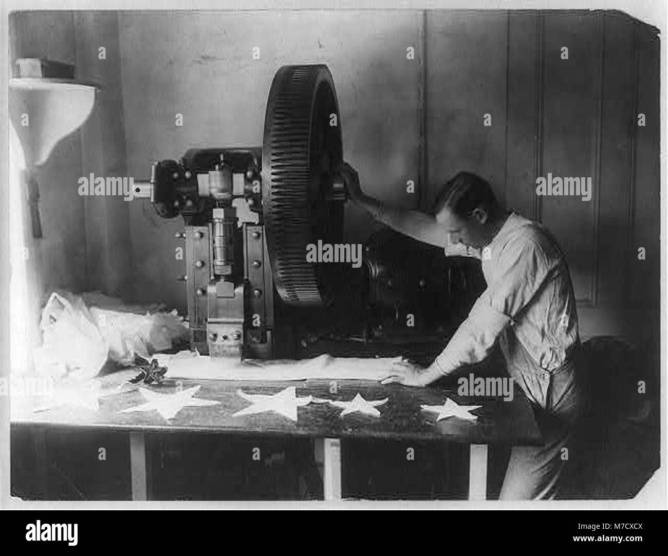 Man using cutting machine Black and White Stock Photos & Images - Alamy