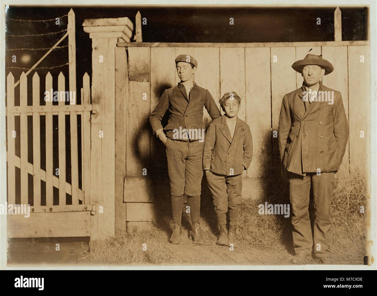 A flashlight photograph of two boys leaving King Mfg. Co. in Augusta ...