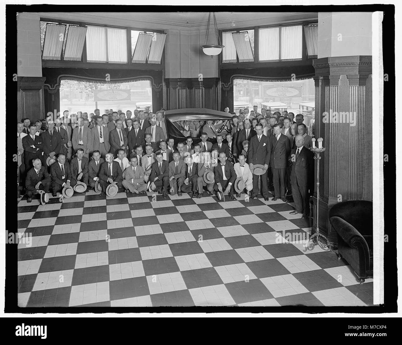 A photograph of Ford Motor Company dealers, showcasing their role in ...