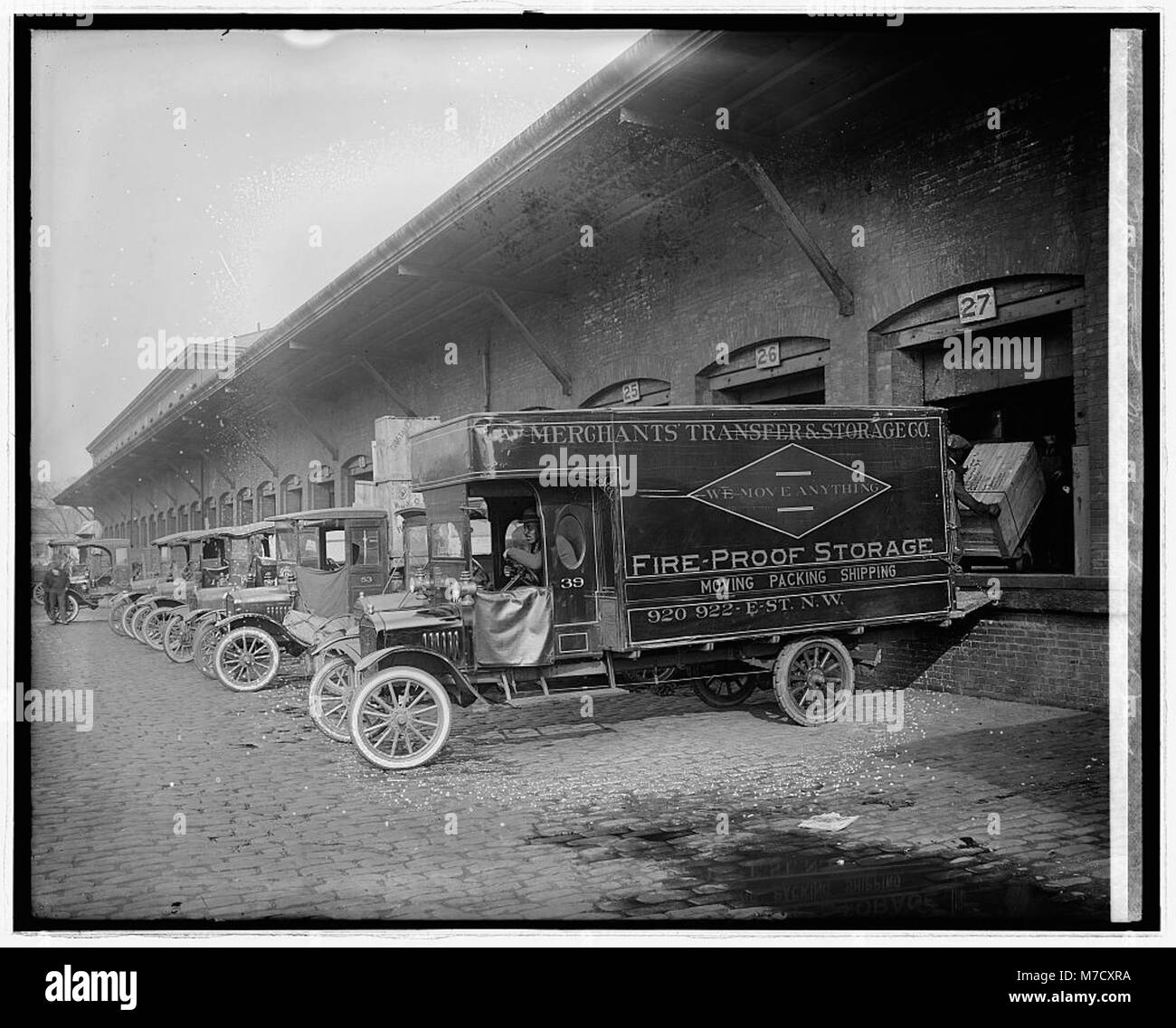 A Ford Motor Company truck used by Merchants Transfer, showcasing early ...
