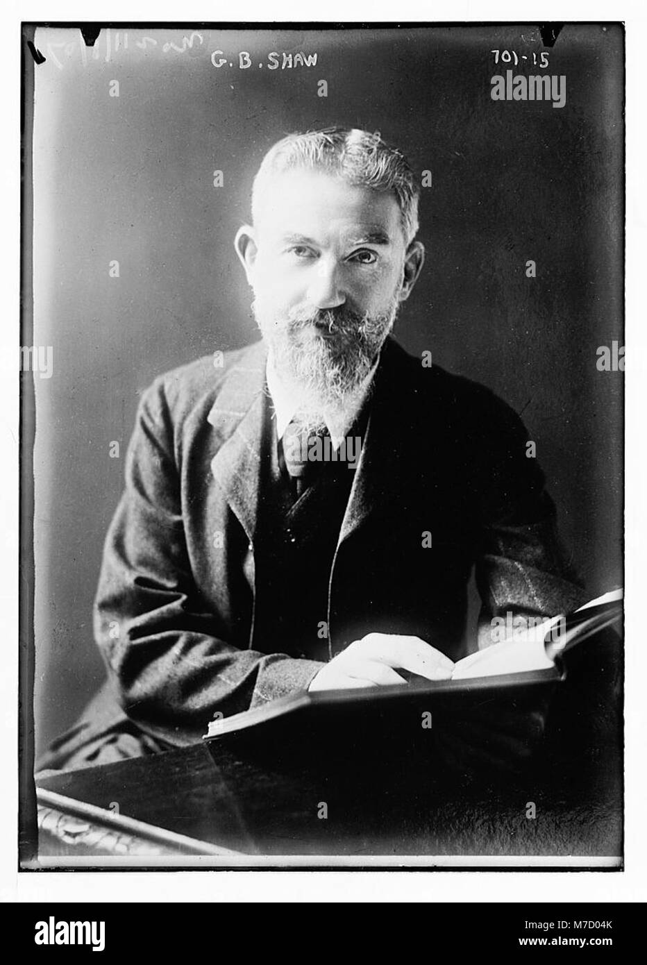 A photograph of George Bernard Shaw, the famous playwright, seated at a ...