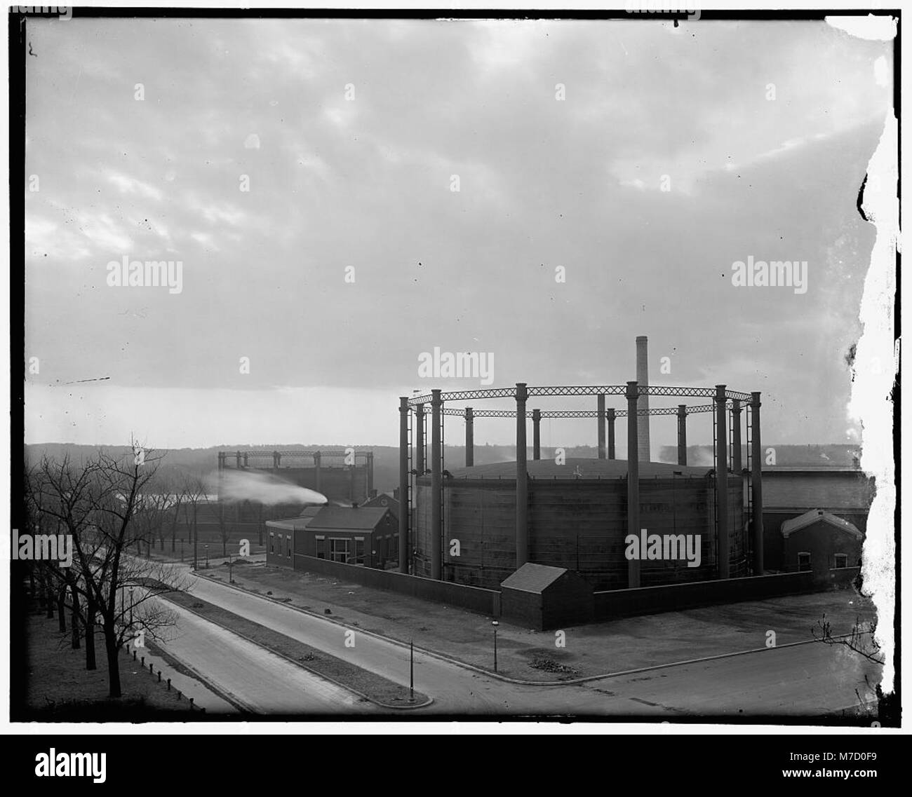 A photograph showing a gas tank located at the intersection of 26th and ...