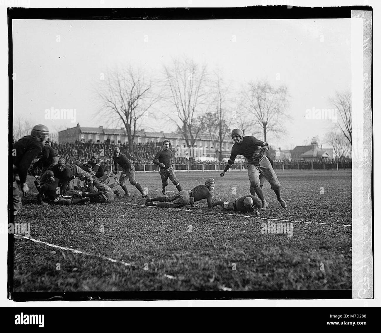 This photograph captures a historic football game between Georgetown ...