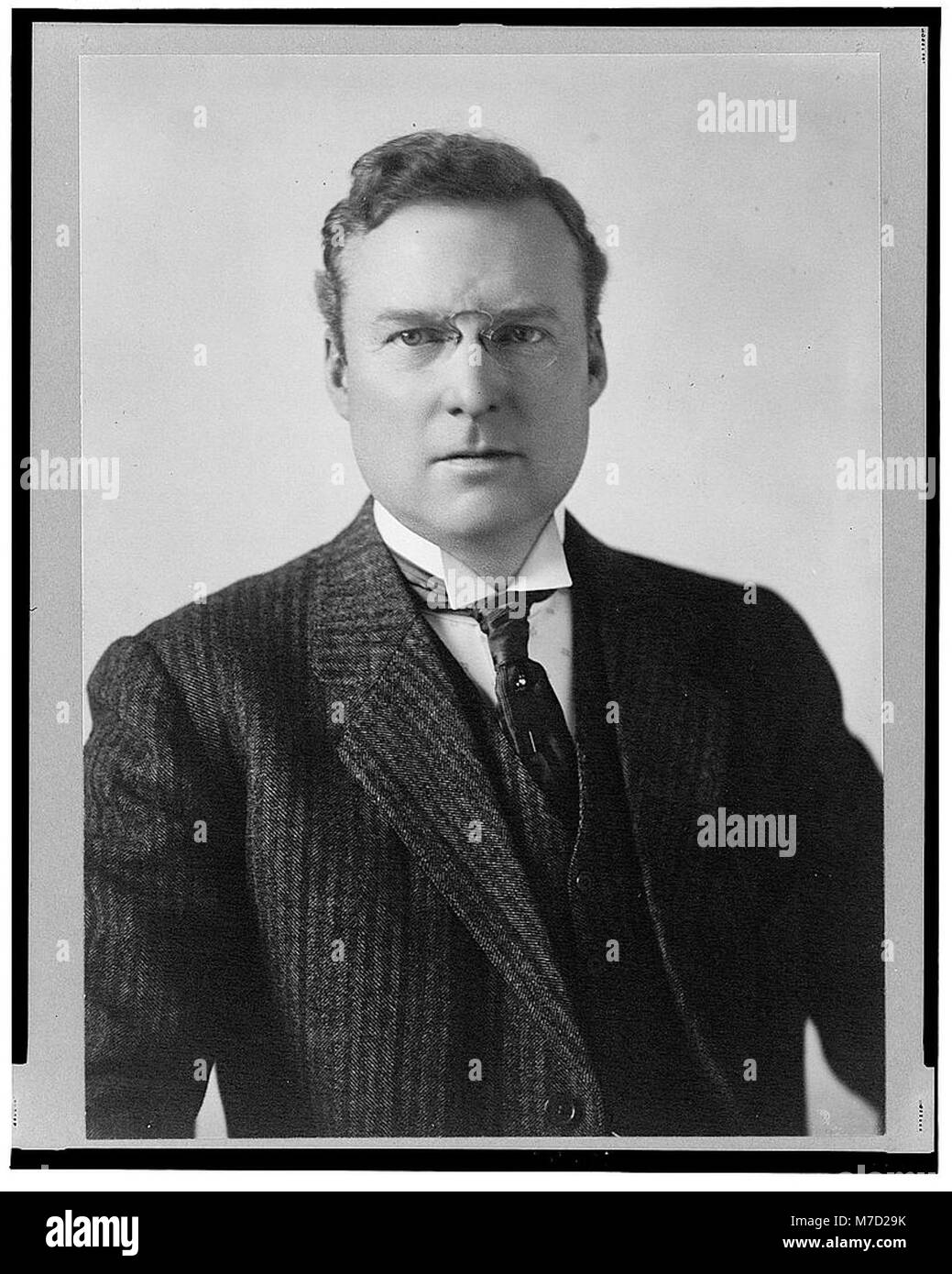A formal half-length portrait of George A. Carpenter, showcasing his ...