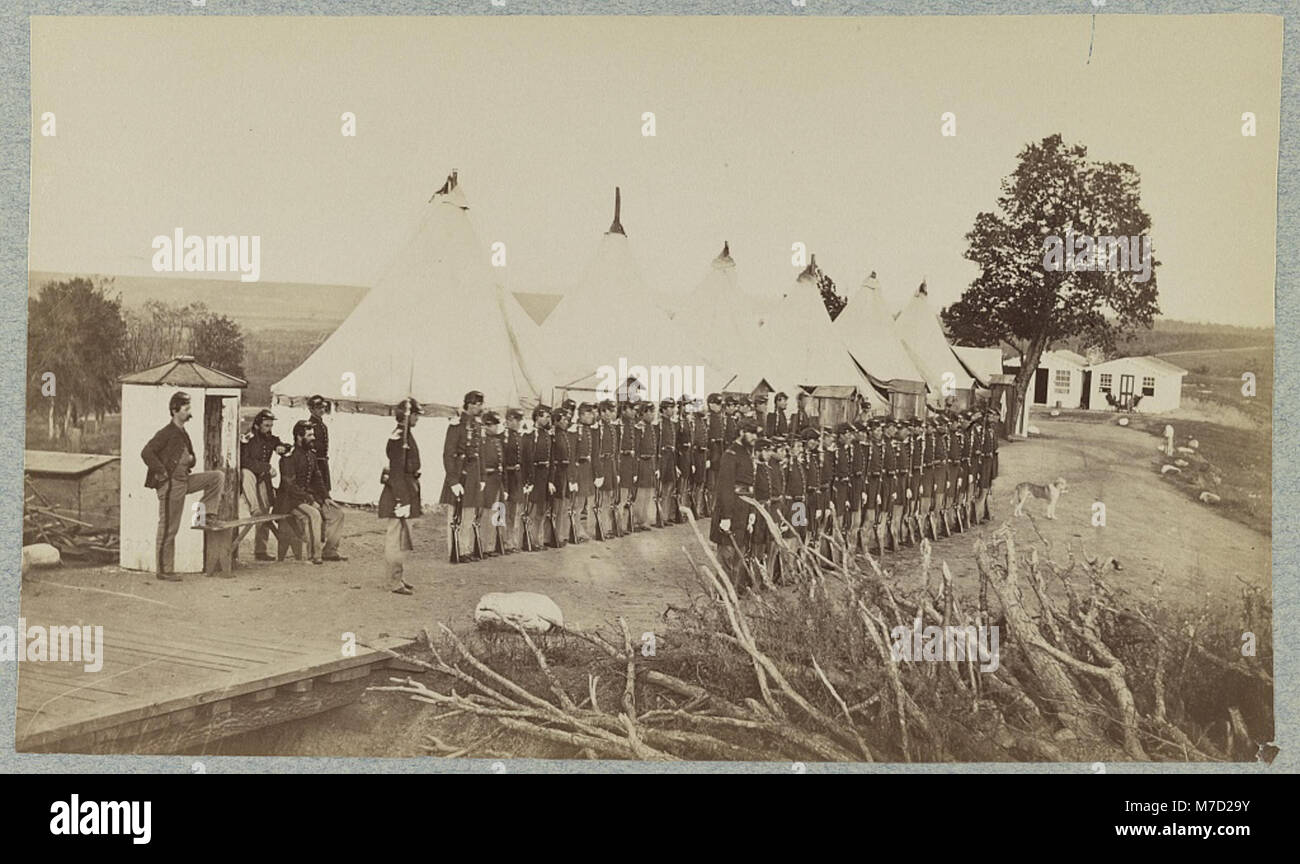 A photograph of Union soldiers lined up in front of tents during the ...