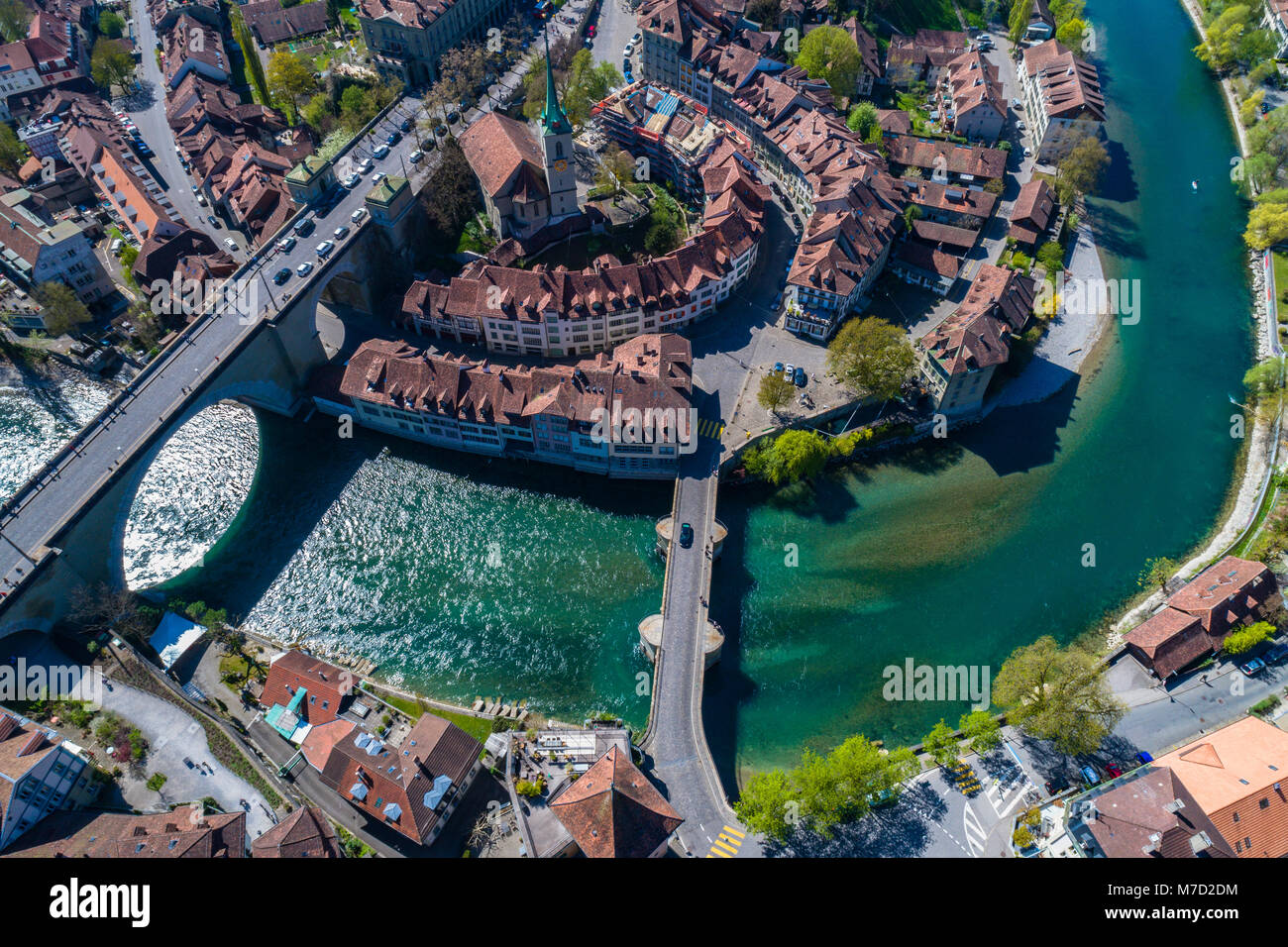 Aerial view of the Aare river flowing around the Bern old town on a ...