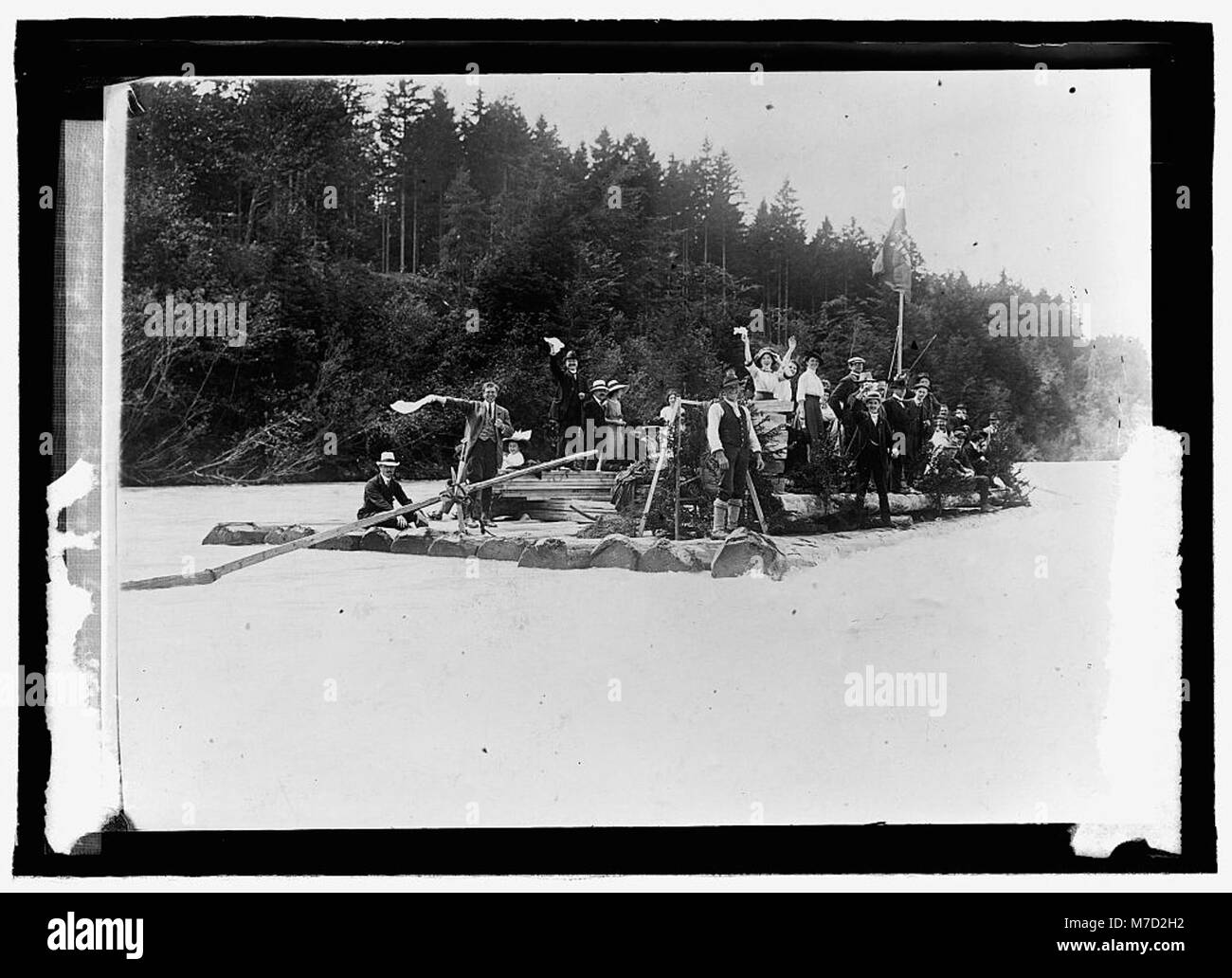 A passenger raft on the Isar River in Germany, depicting early 20th ...