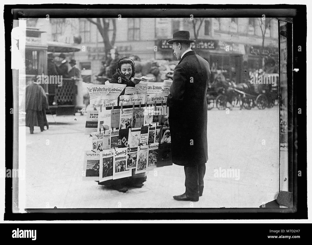 A historical photograph showing women newspaper dealers in Berlin ...