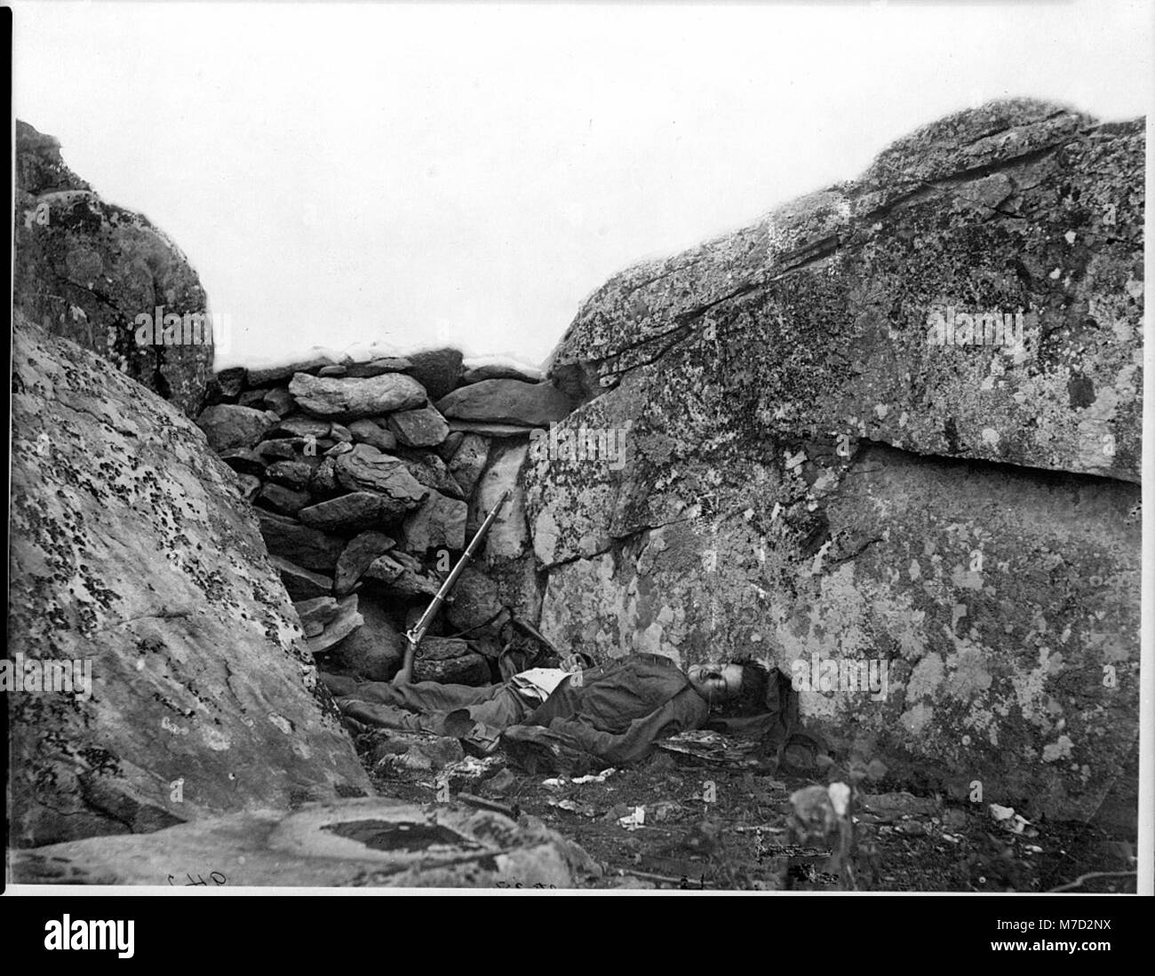 This photograph captures a Confederate soldier who fell at Devil's Den ...