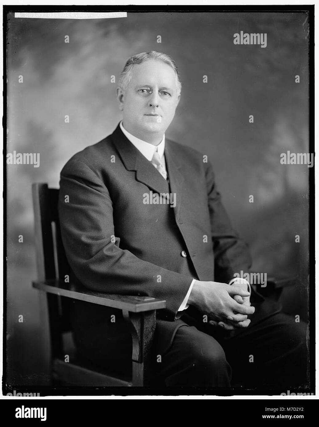 This image features Edward Gilmore, an honorable figure, likely ...