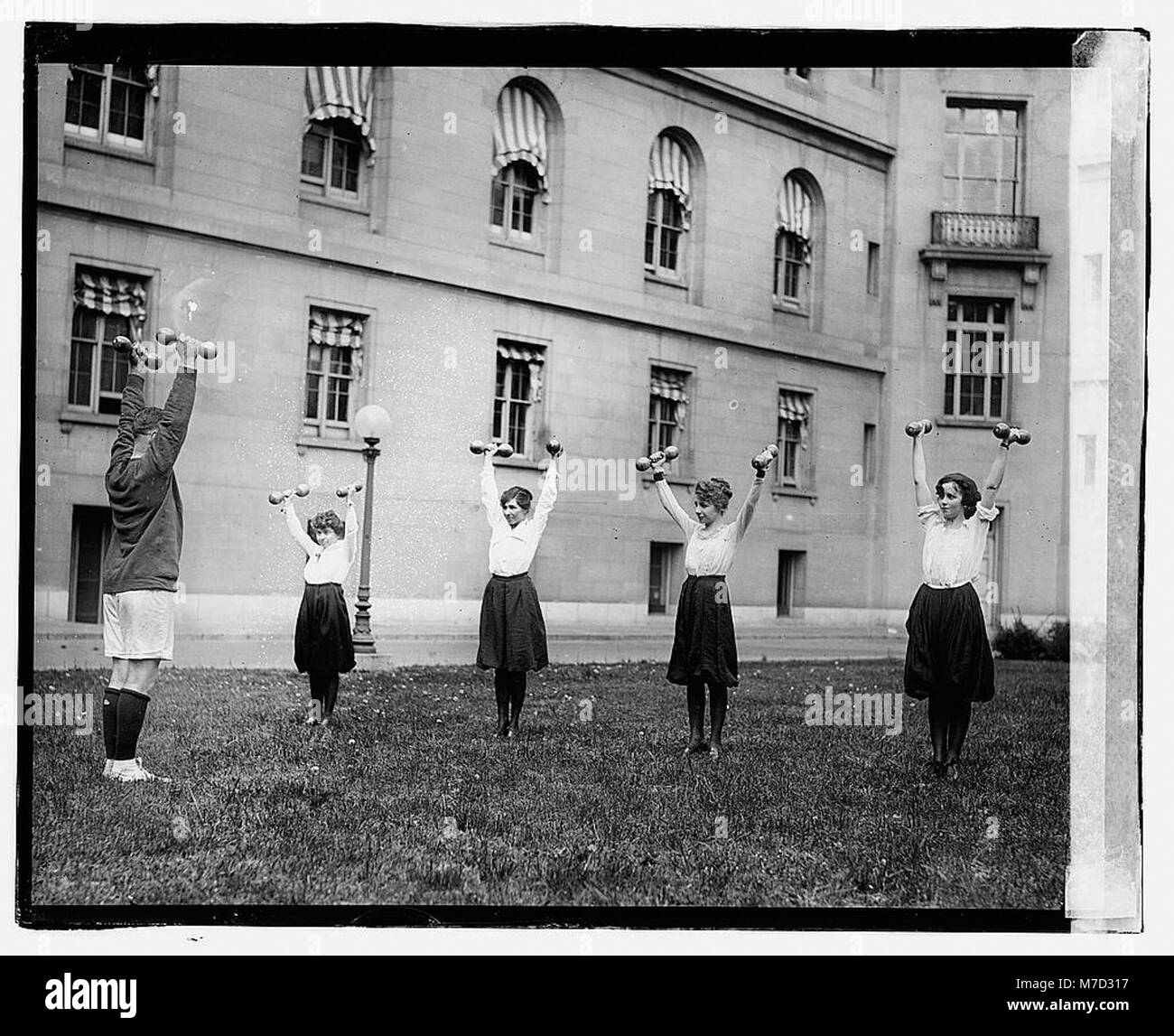 A photograph of girls engaging in physical activities in a house gym ...