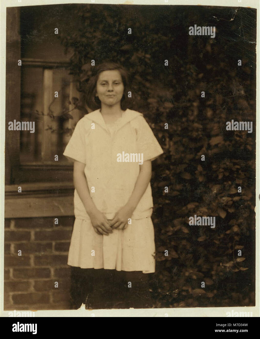 This image captures Gladys Goodrum, a 12-year-old girl from Columbus ...