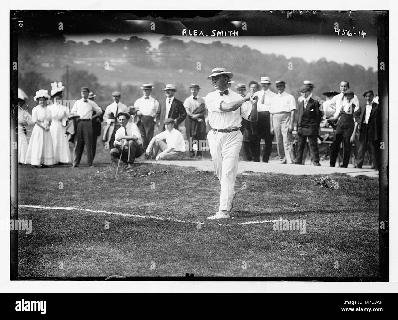 A photograph of a golf match featuring Alex Smith, highlighting the ...