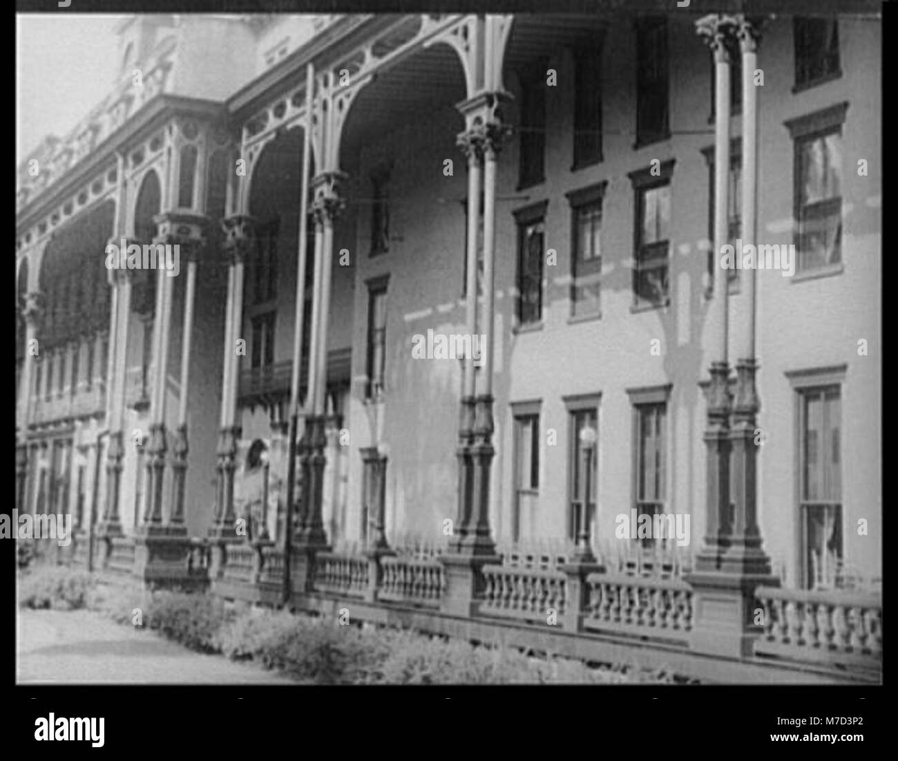 An architectural photograph focusing on a detailed view of the Grand Union Hotel in Saratoga ...