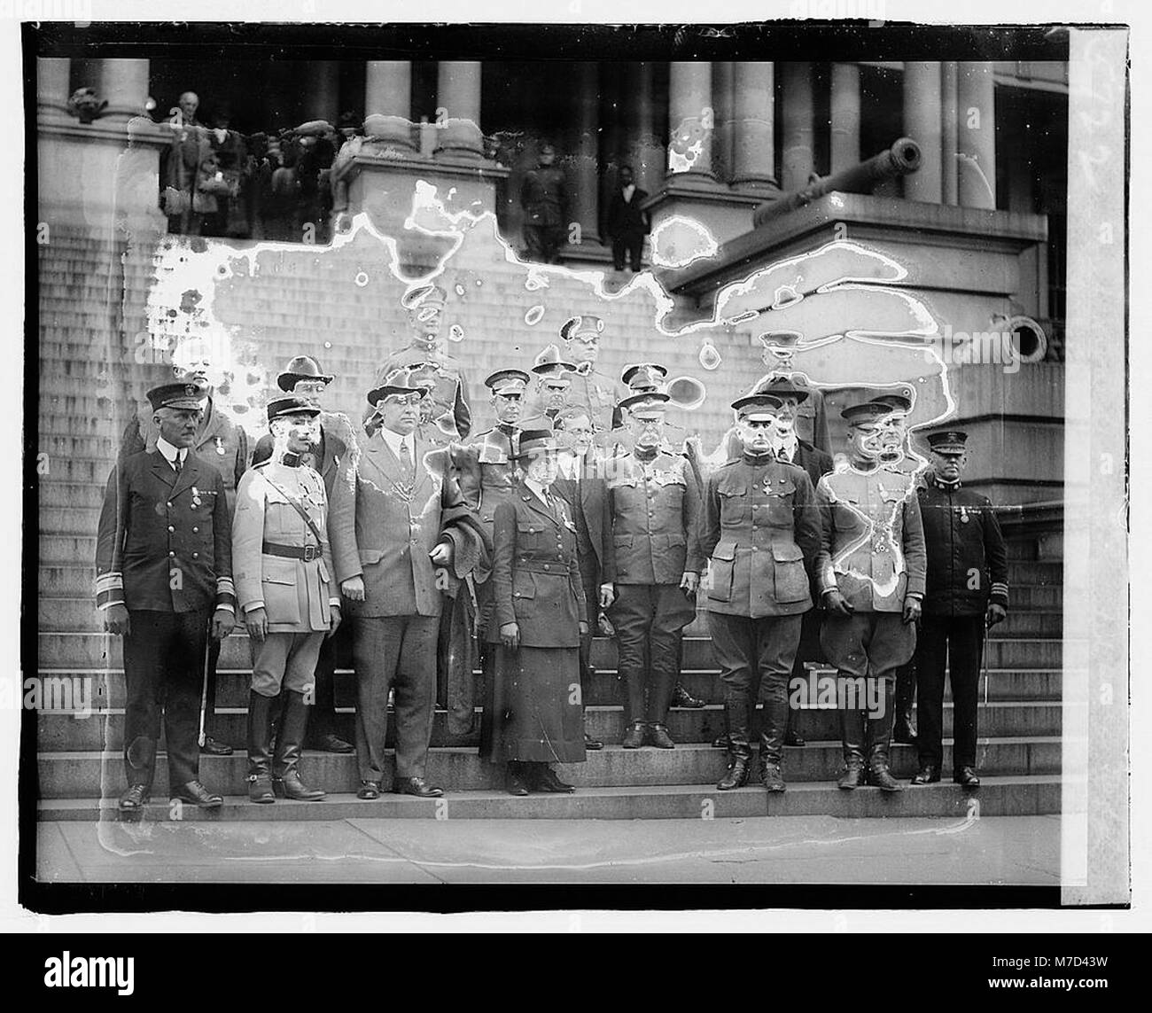 A group of individuals receiving the Distinguished Service Medal for ...