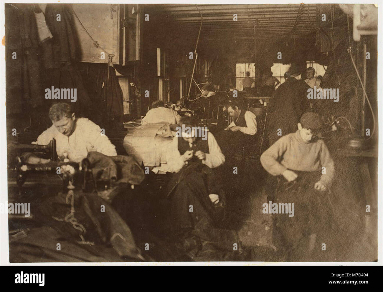 A photograph of sweatshop workers at the M. Silverman shop, located at ...
