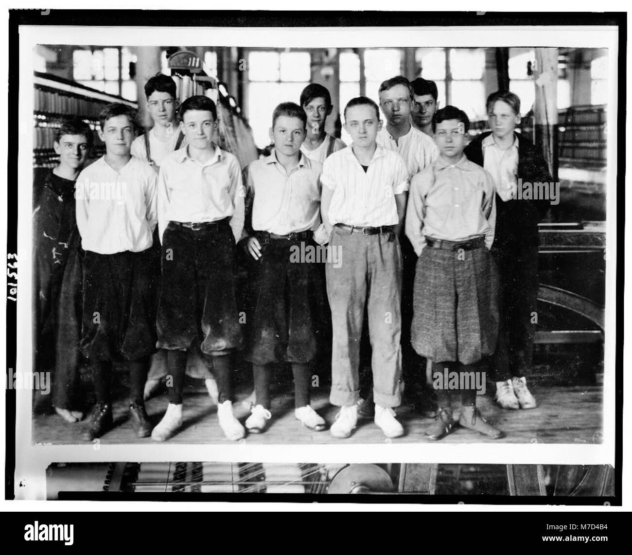 A group of young workers, mostly 14 and 15 years old, photographed in ...