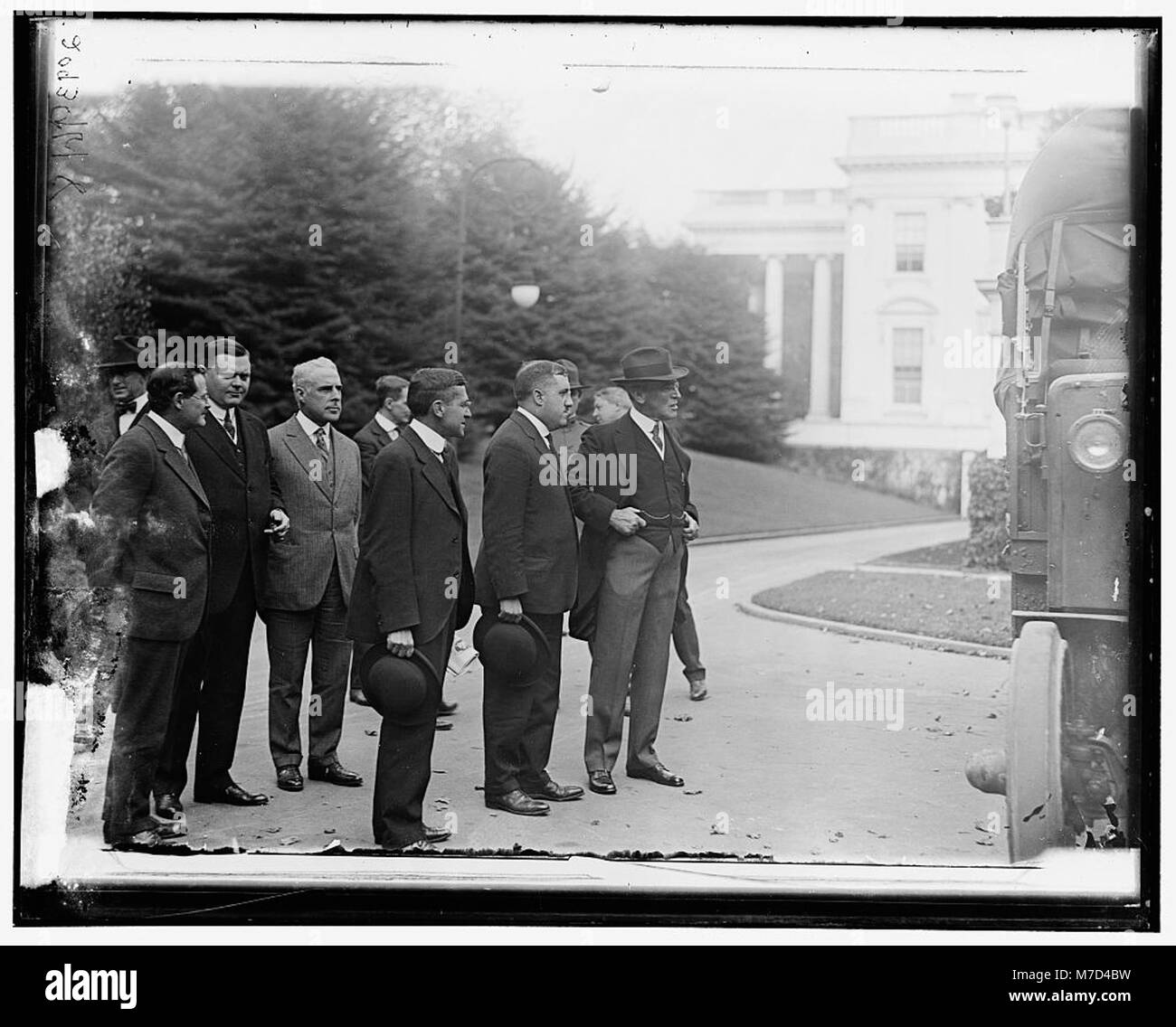 A photograph showing a group outside the White House, featuring U.S ...