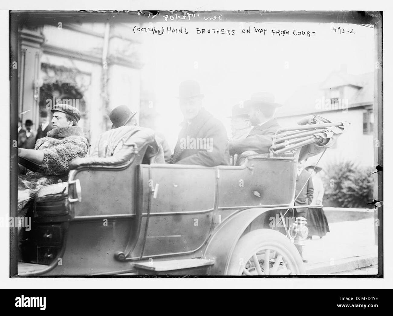 A photo showing the Hains Brothers leaving court in New York, possibly ...
