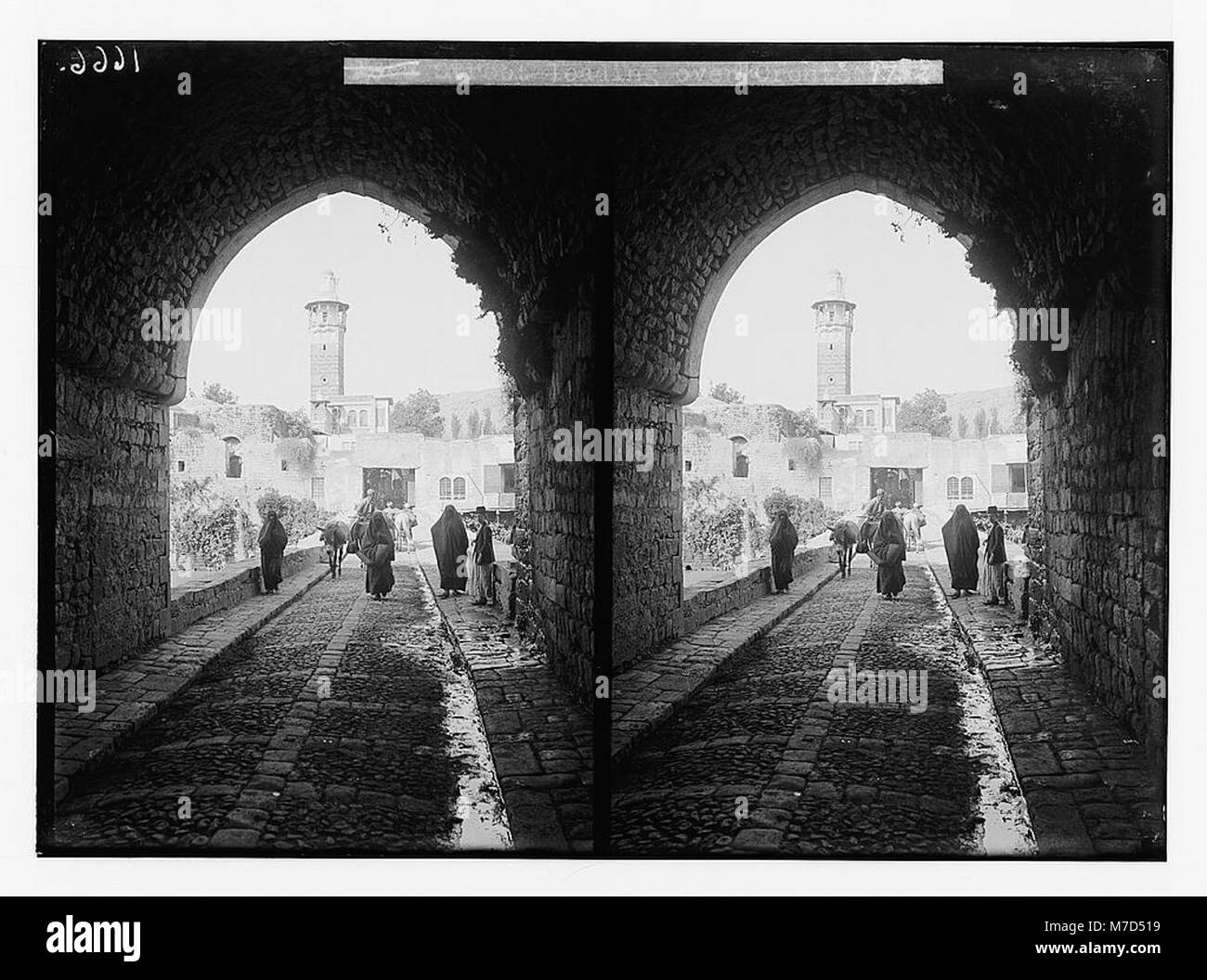 A historical photograph of Hama (Hamath), showing a street leading over ...