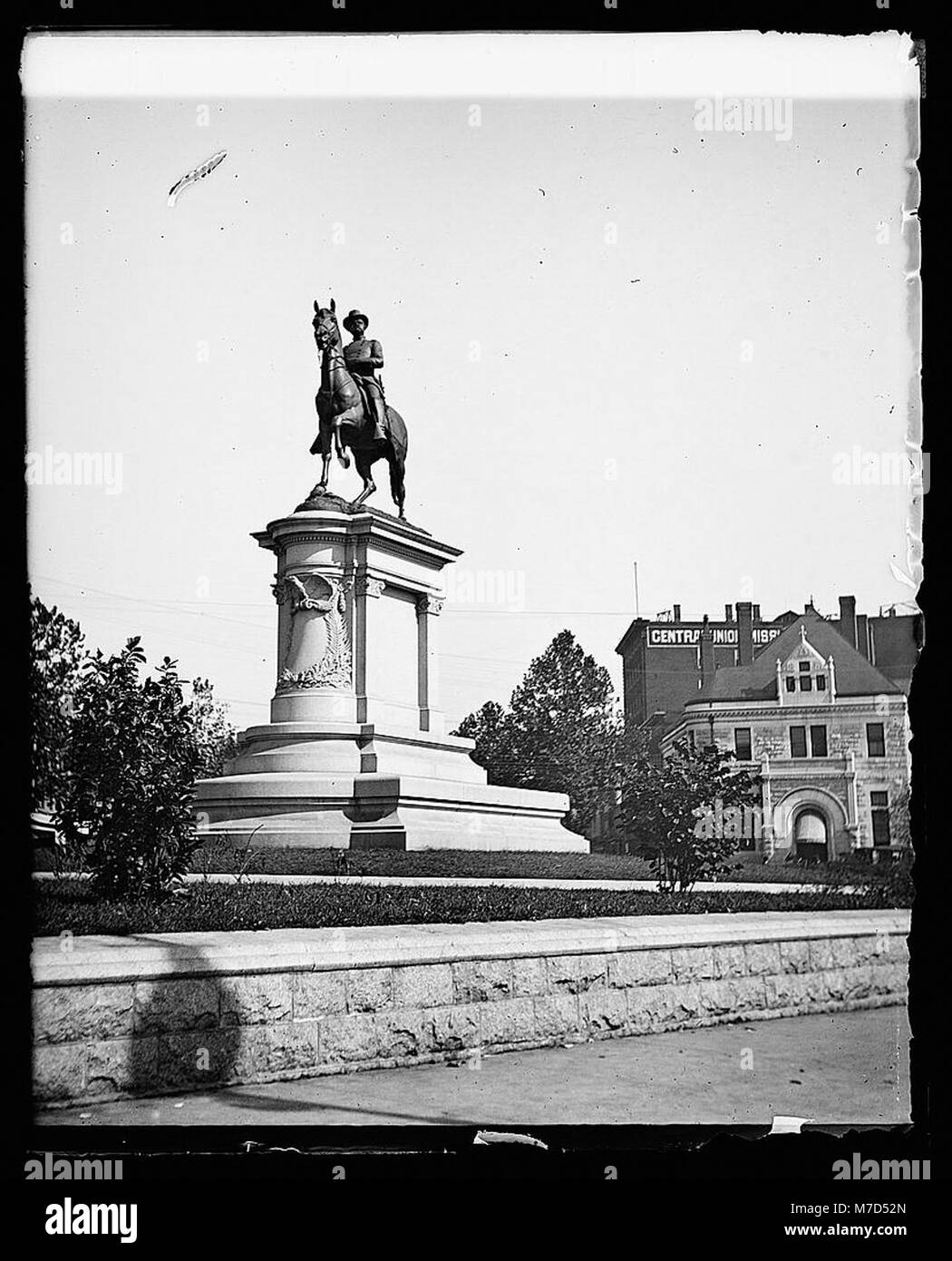 A photograph of the Hancock Statue, located in a public space. This ...