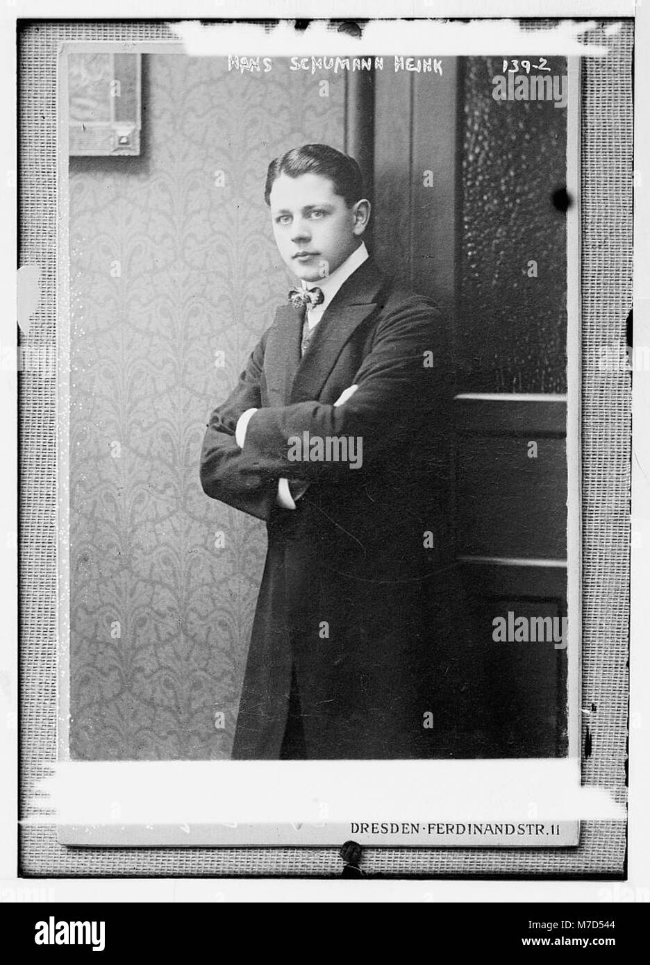 This portrait of Hans Schumann-Heink shows him standing three-quarters ...