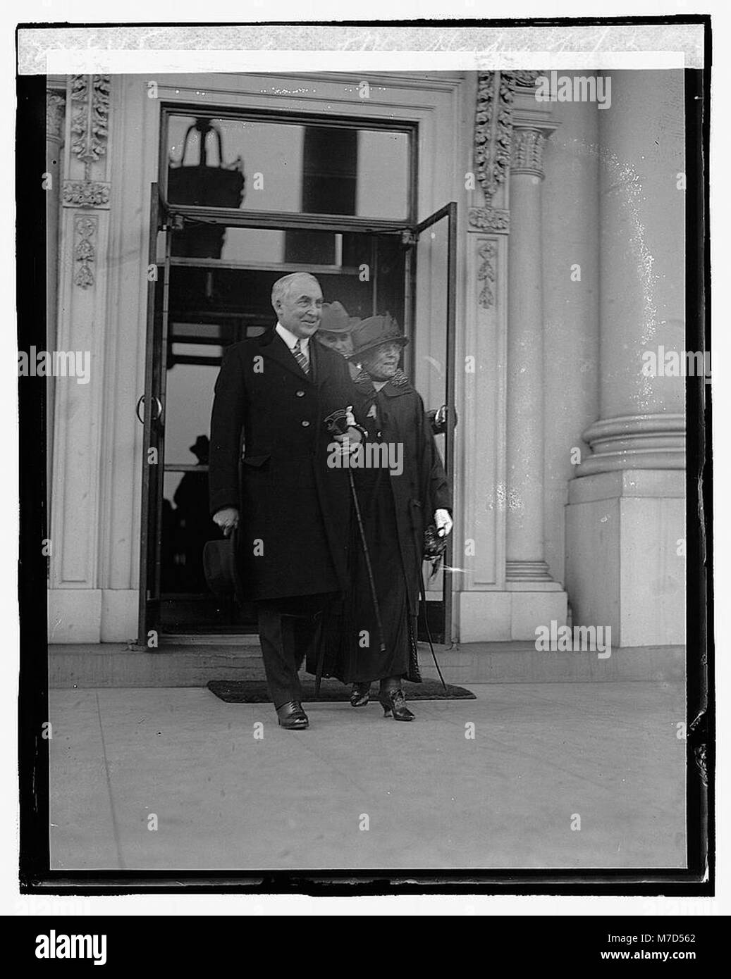A photograph of President Warren G. Harding and his wife, Mrs. Florence ...