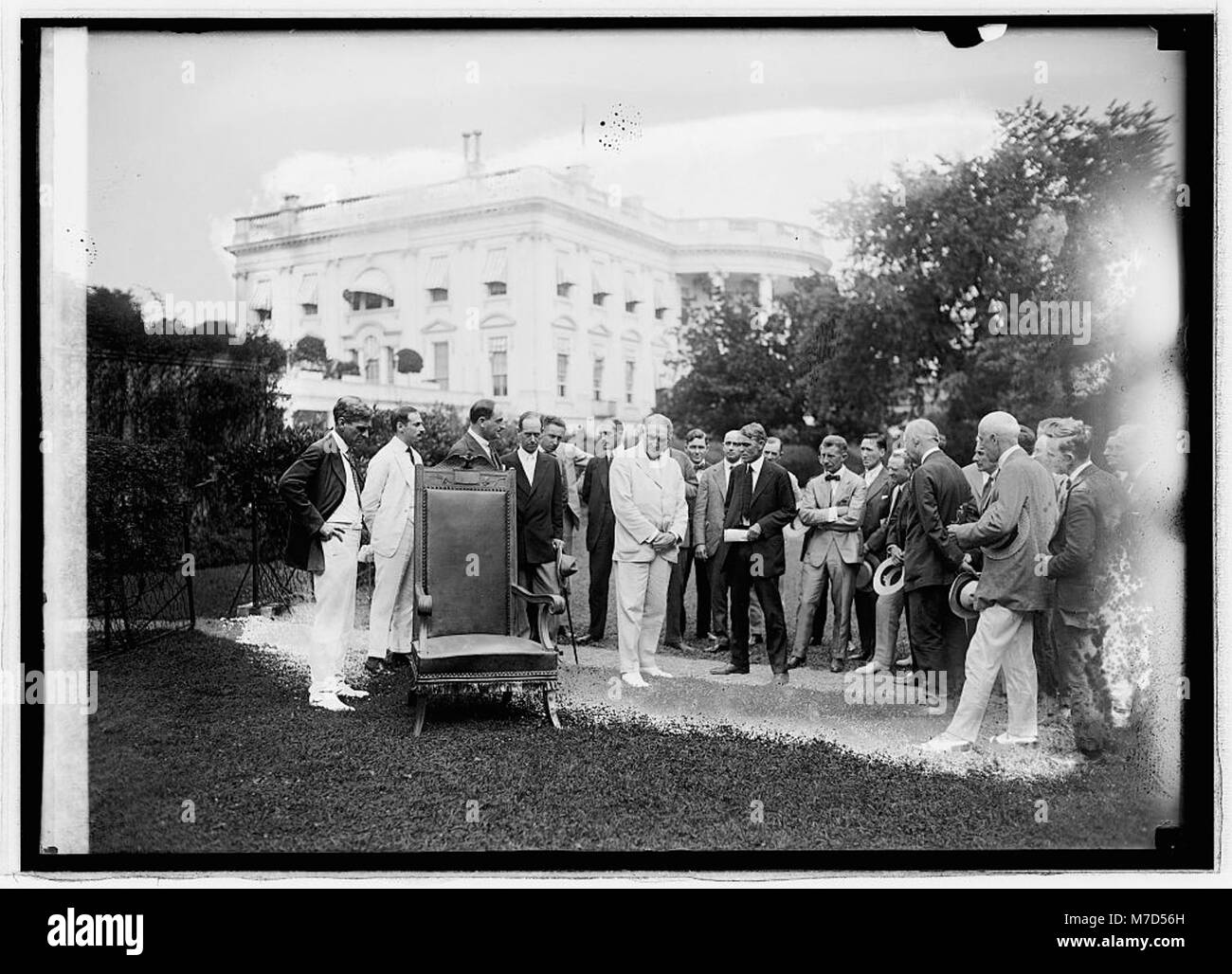 A photograph of Harding sitting in his editorial chair, an important ...