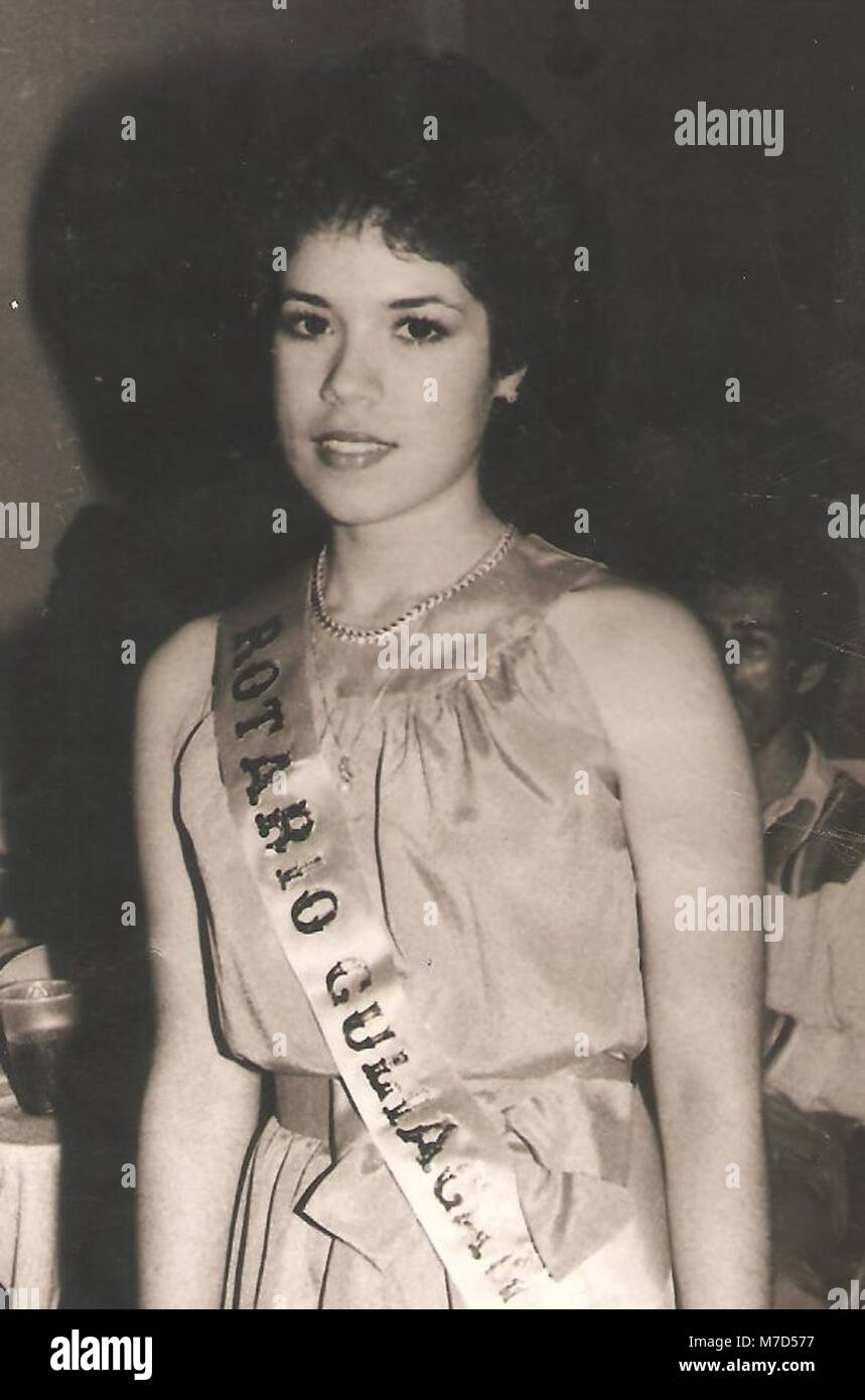 A photograph featuring Eneida Salazar Villa Velazquez at a Rotary Club ...