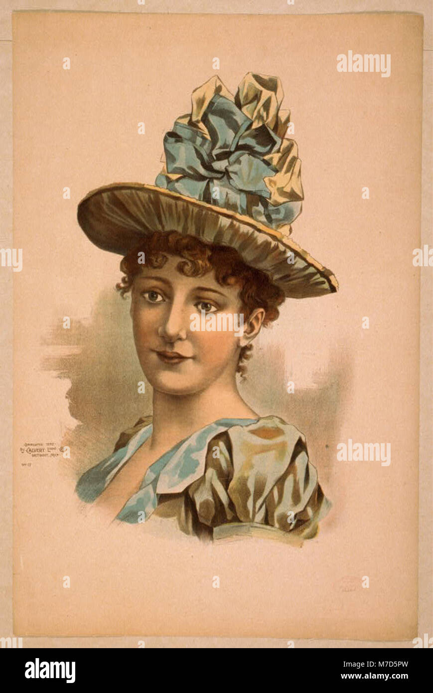 A head-and-shoulders portrait of a brunette woman, facing right ...