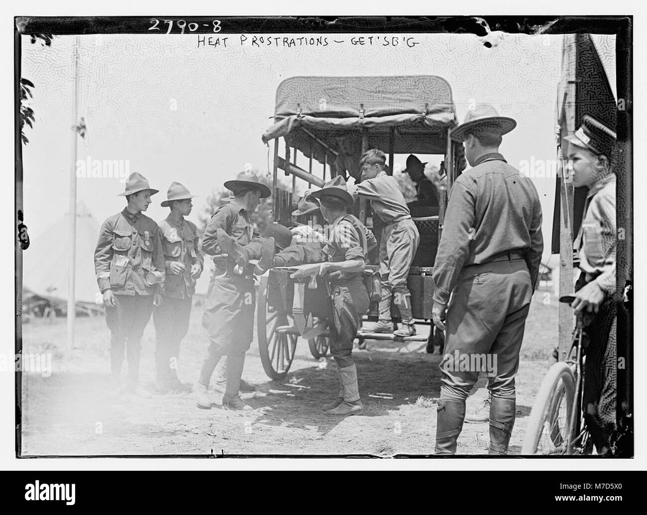 A photograph depicting soldiers experiencing heat exhaustion during the ...