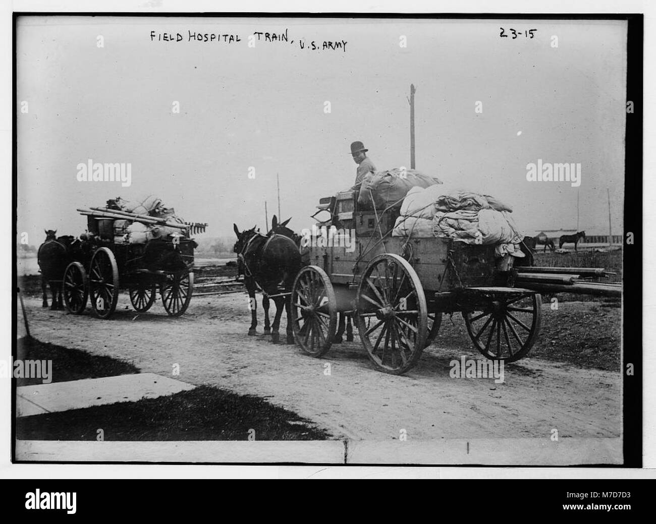 This image shows horse-drawn wagons used in a field hospital train ...