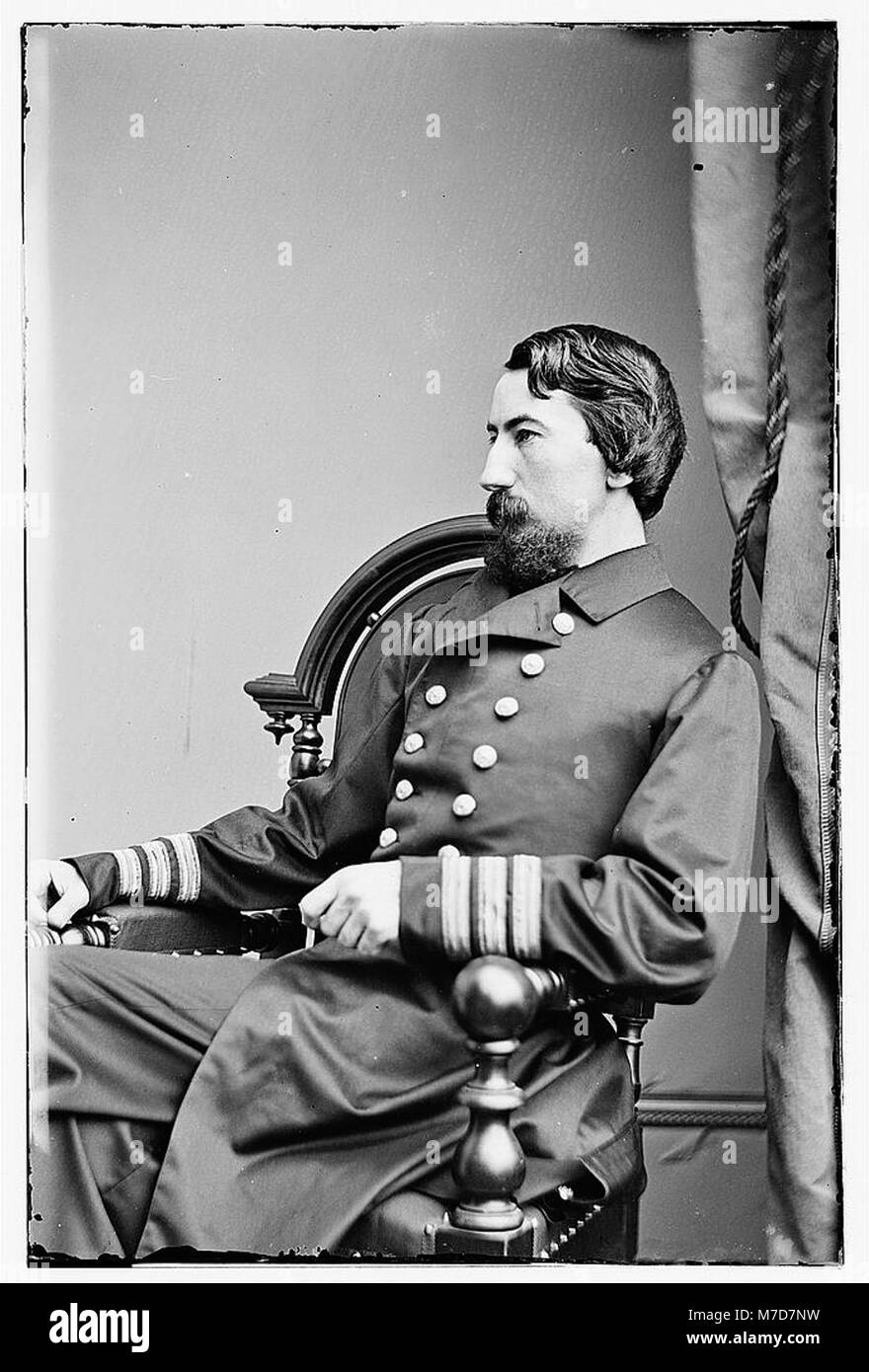 A portrait of Howard, a United States Navy officer, captured in uniform ...