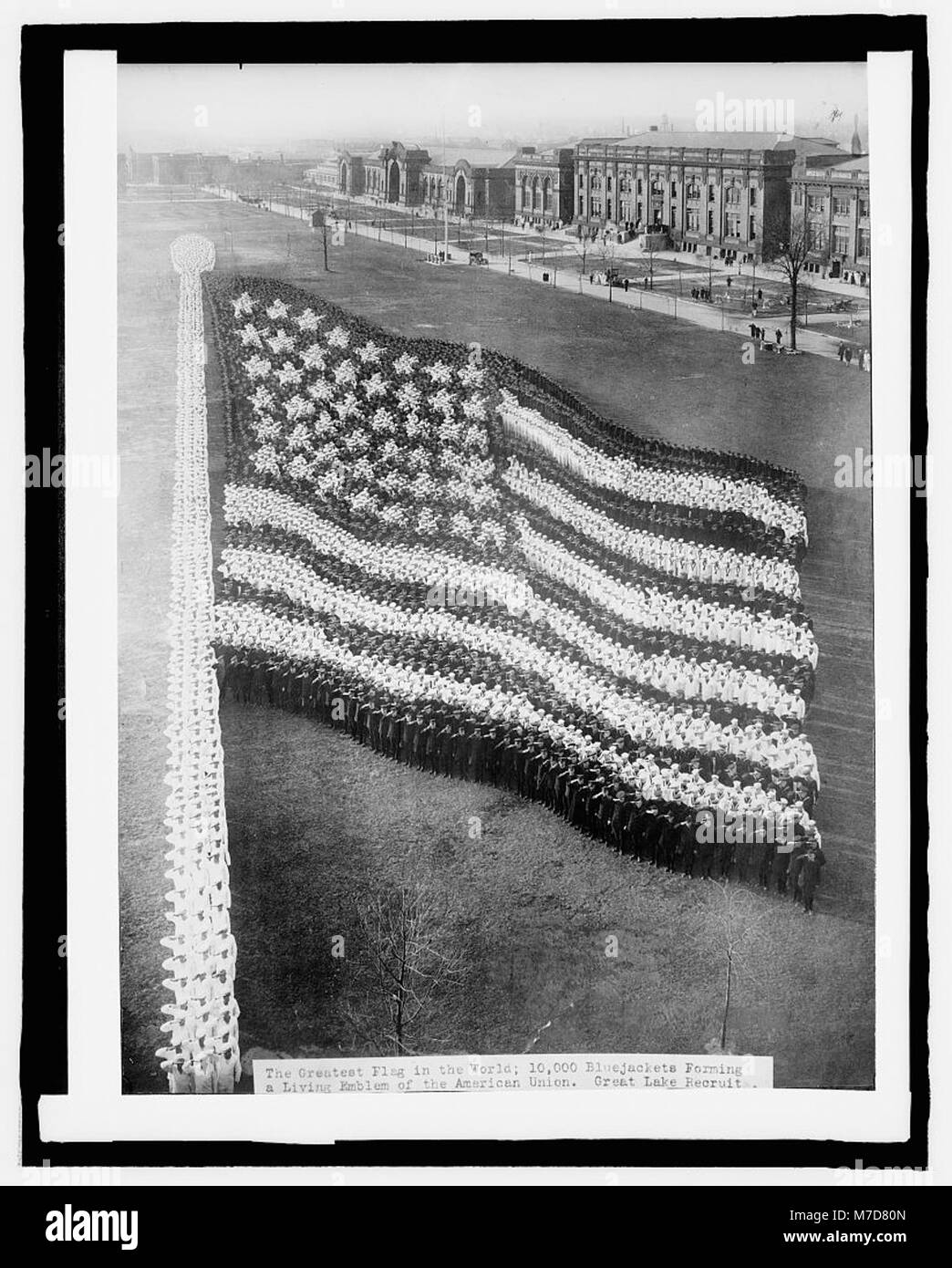 The image shows a human flag formation at the Great Lakes Training ...