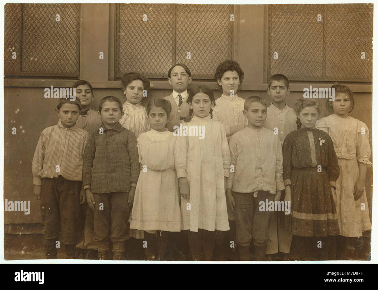 Immigrant children at Washington School are depicted in this image ...