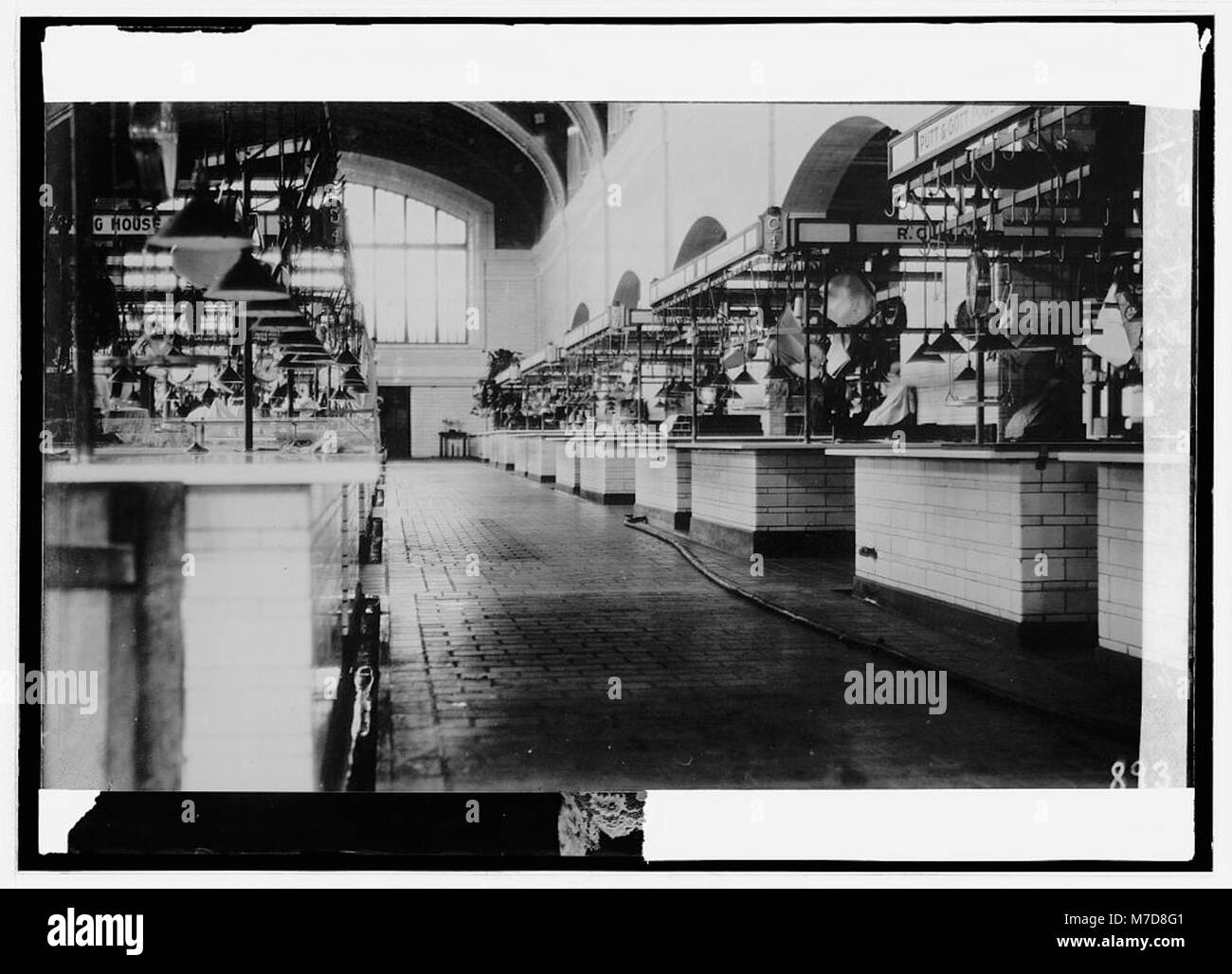 This photograph captures the interior of a modern market, showcasing ...