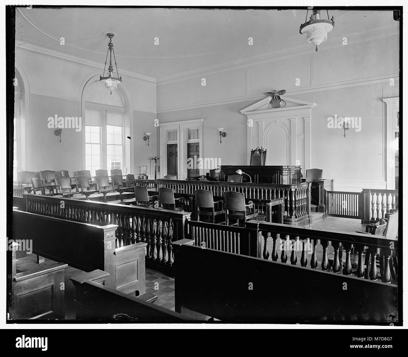 This photograph showcases the interior of a courthouse, illustrating ...