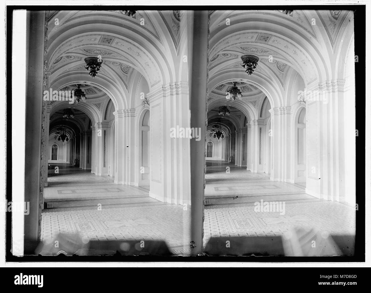 The interior of a library is shown in this photograph, highlighting its ...
