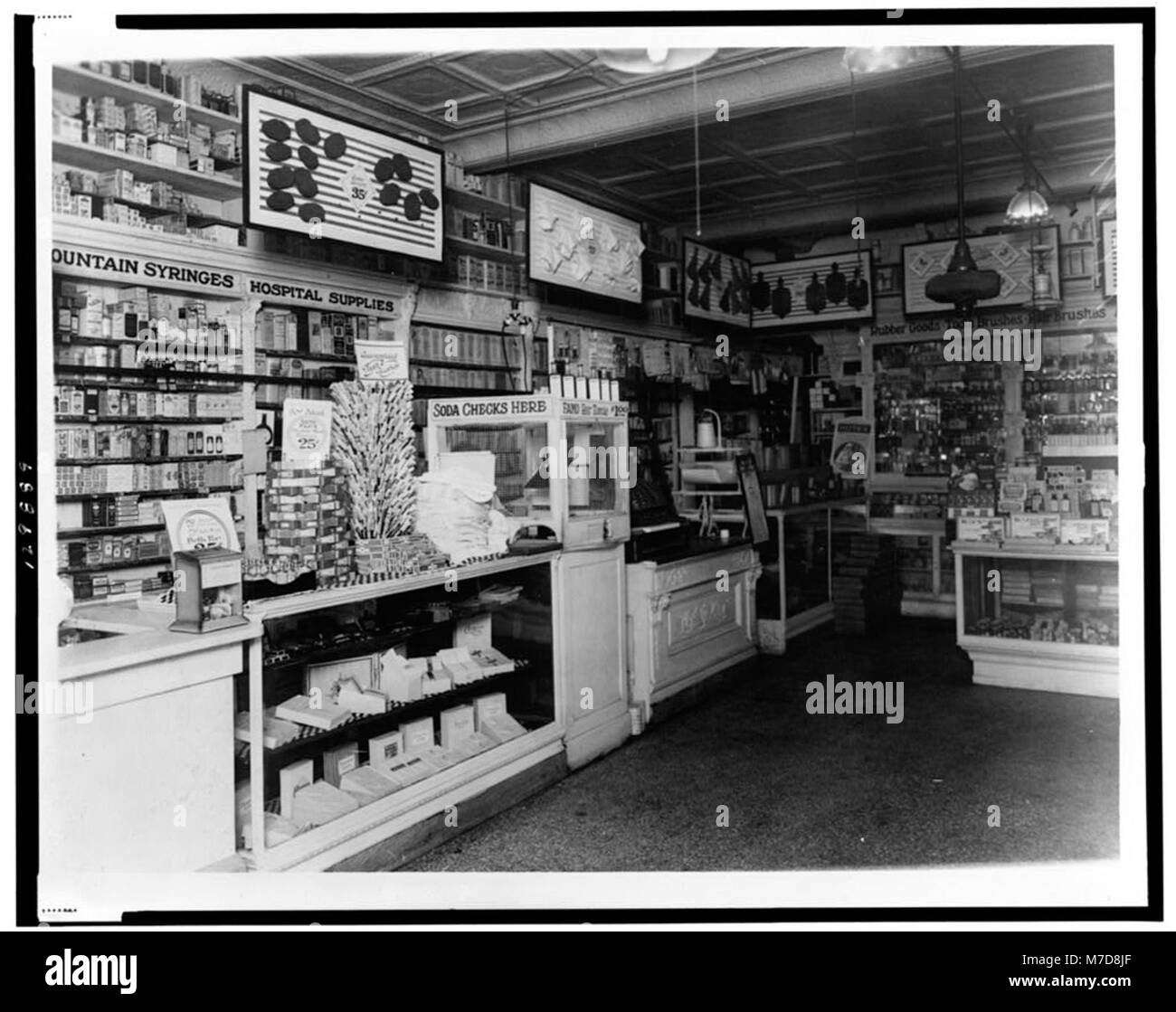 This photograph shows the interior of People's Drug Store located at ...