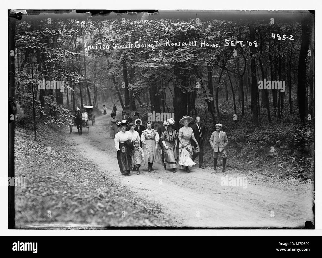 A group of invited guests walking towards Roosevelt House in Hyde Park ...