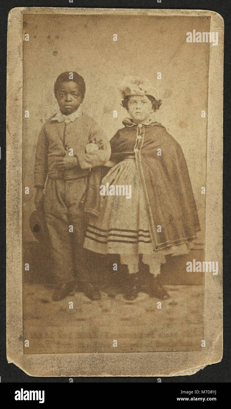 This historical photograph depicts Isaac and Rosa, two slave children ...